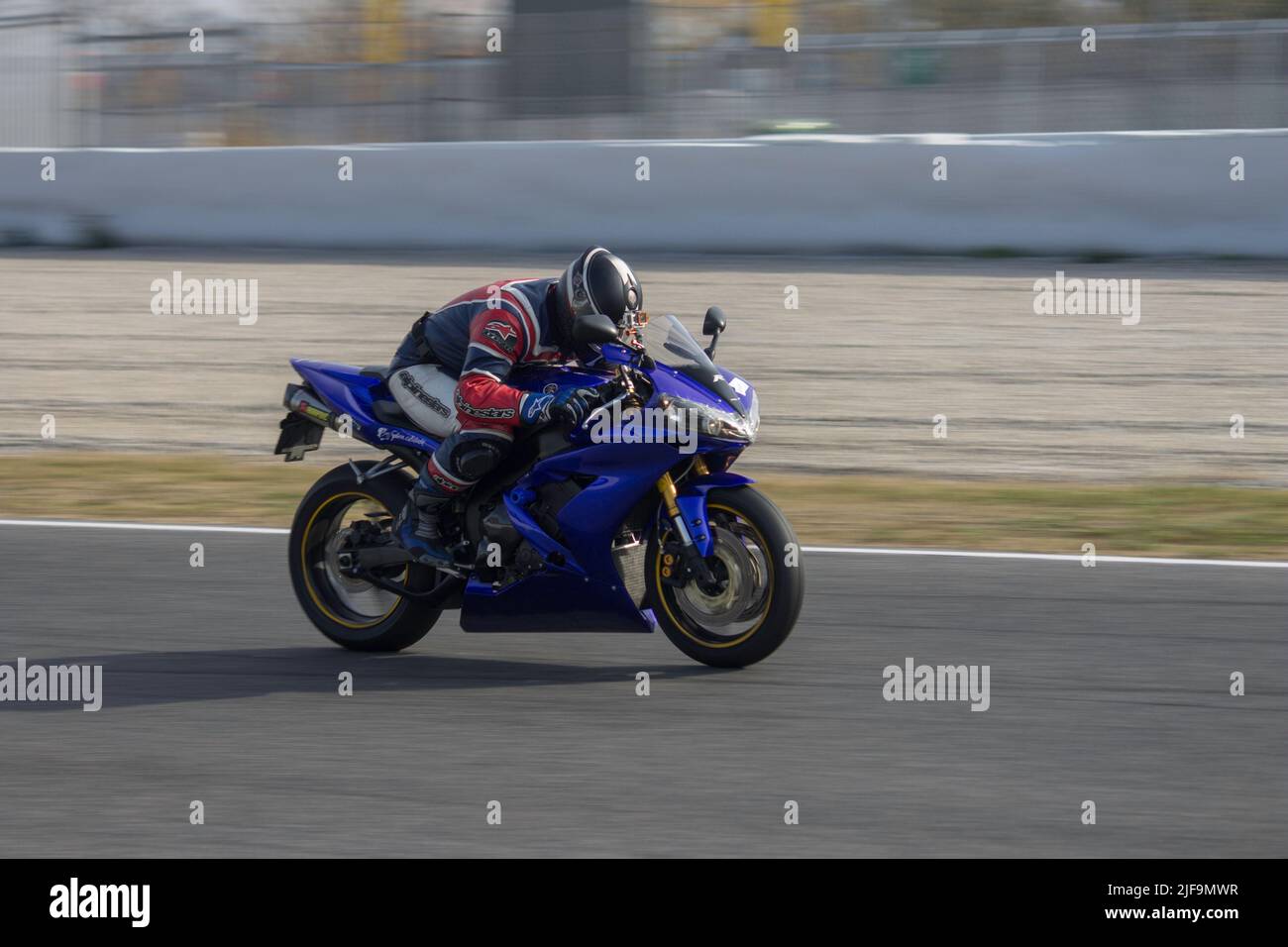 Modern fast sport motor bike in the track. Yamaha R1 Stock Photo - Alamy