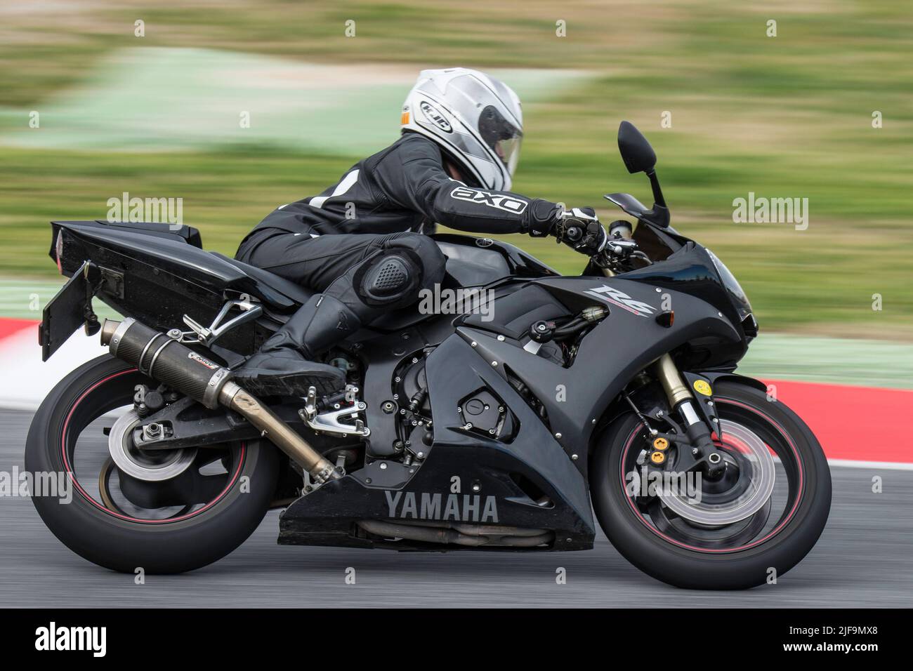 Modern fast sport motor bike in the track. Yamaha R6 Stock Photo - Alamy