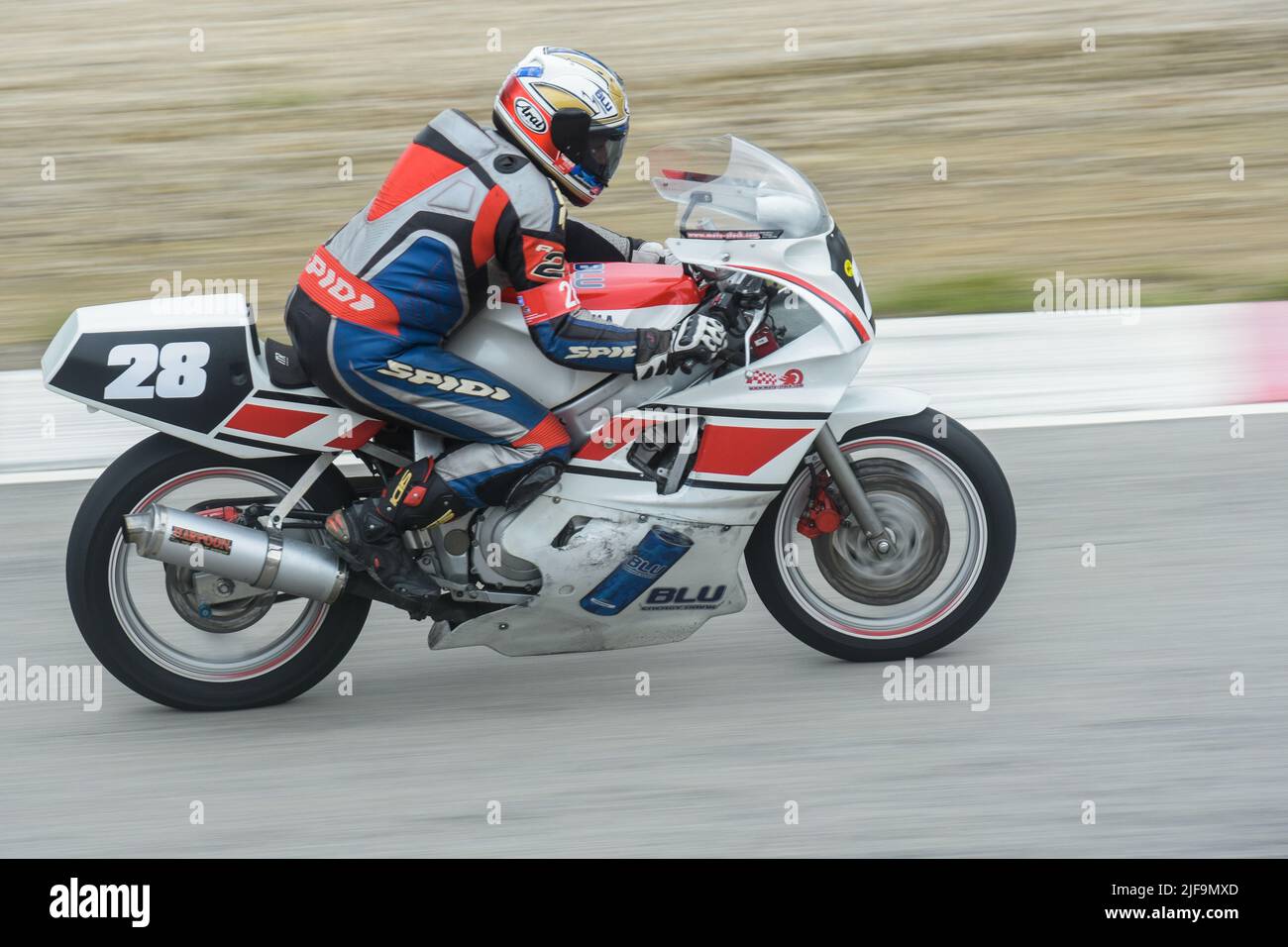 Fast racing motor bike in the track. Yamaha classic Stock Photo - Alamy
