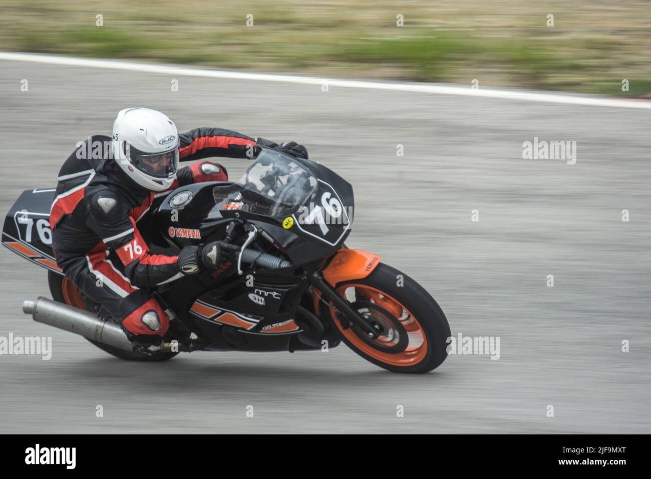 Fast racing motor bike in the track. Yamaha classic Stock Photo - Alamy