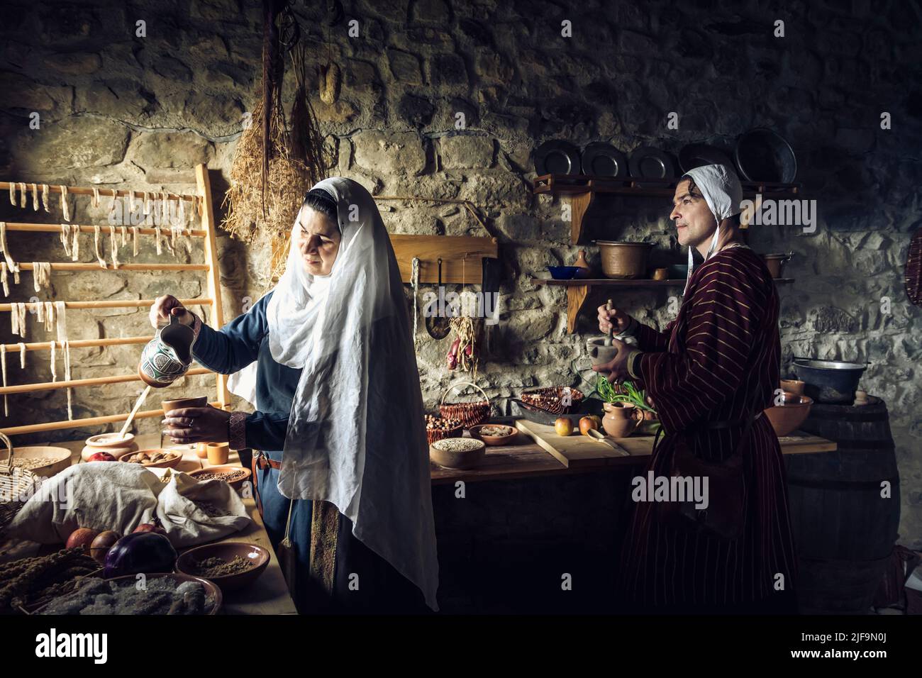 Customs and traditions in 13th century Italy. Cooking Stock Photo - Alamy