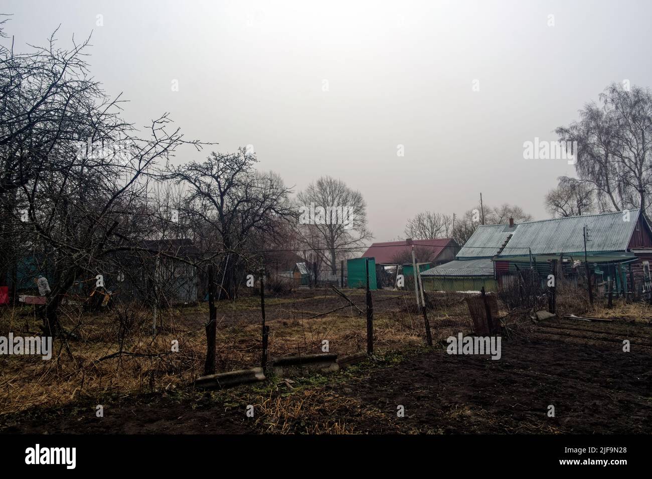 old wooden house in the garden, in spring Stock Photo - Alamy