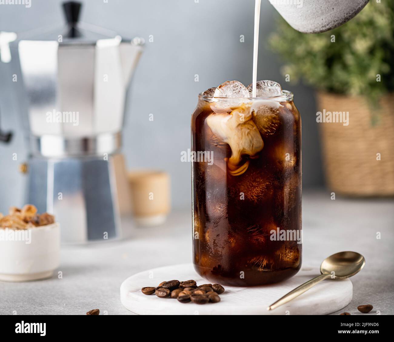 ice coffee with ice cubes Stock Photo - Alamy