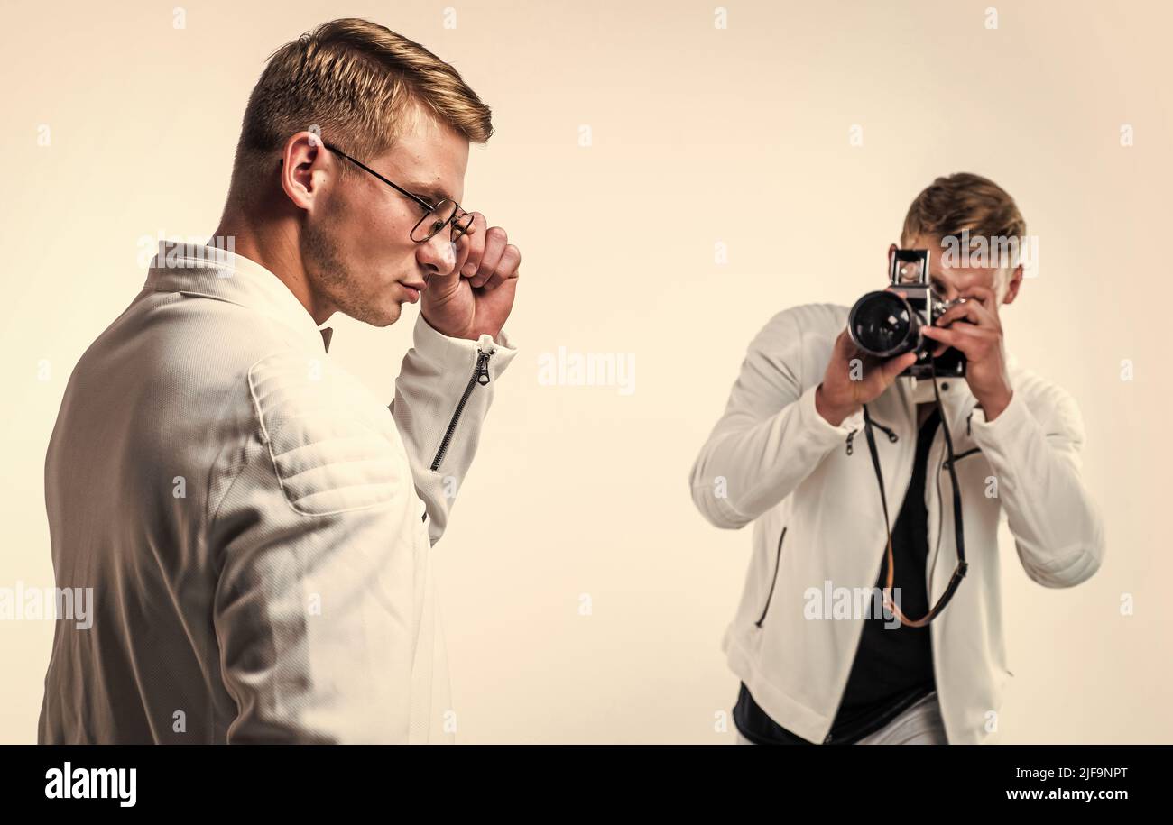 twin brothers men photographer in white casual look alike use vintage ...