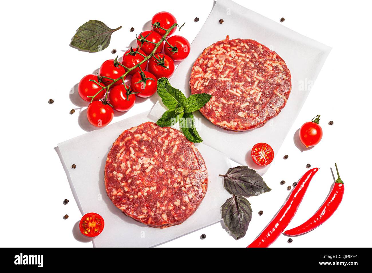 Raw steak cutlets from minced beef meat isolated on white background ...