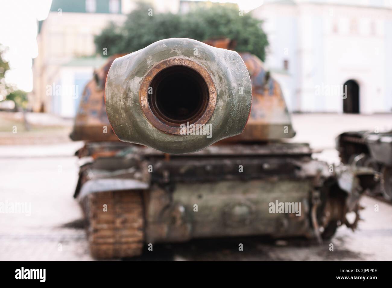 Close up front view of tank gun of burned self-propelled artillery ...