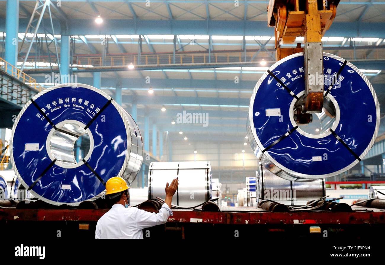 RIZHAO, CHINA - JUNE 30, 2022 - Steel coils are loaded at the workshop ...