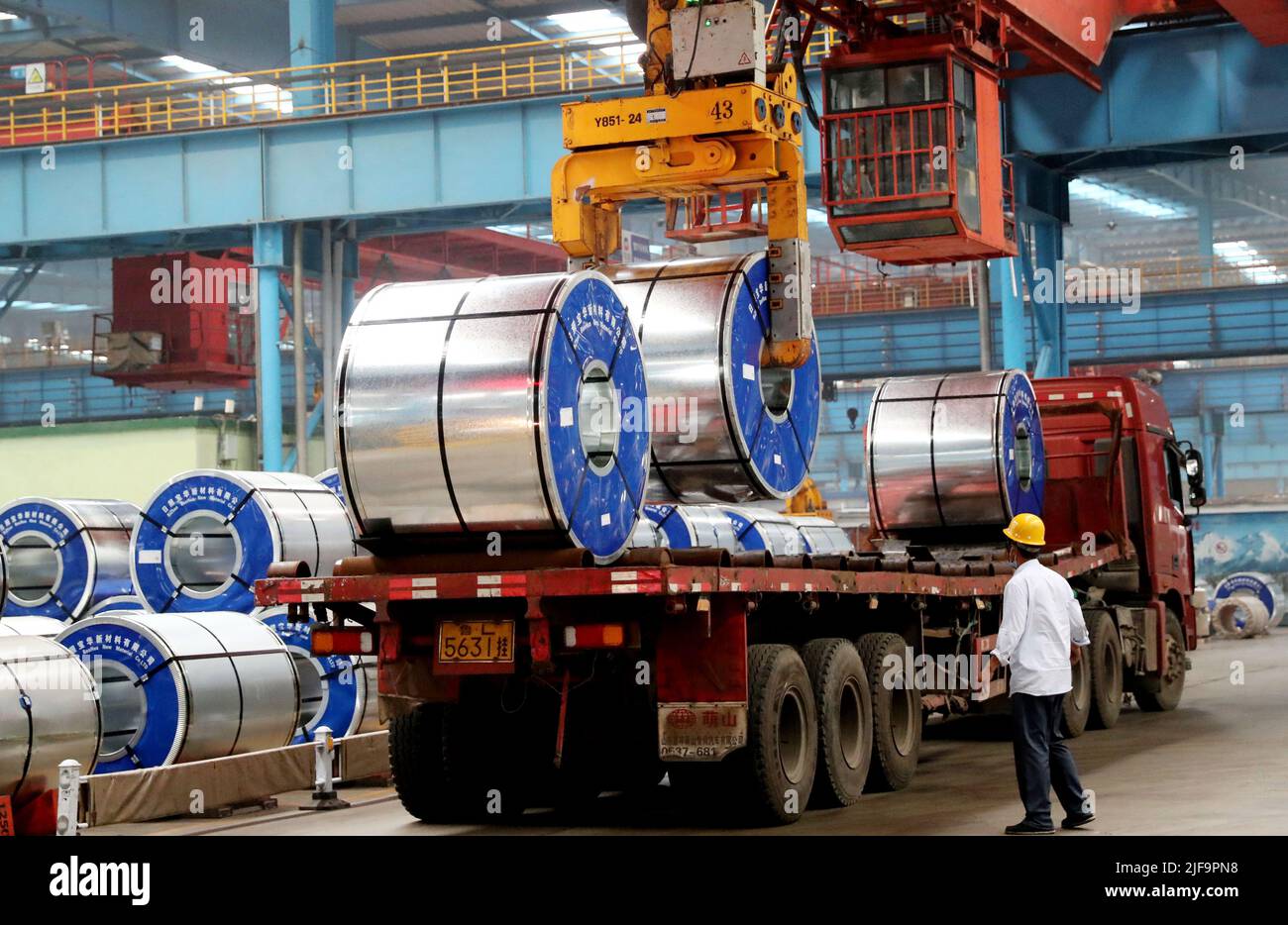 RIZHAO, CHINA - JUNE 30, 2022 - Steel coils are loaded at the workshop ...