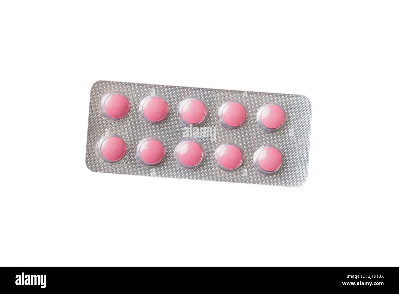 Blister of pills isolated on white background. Tablets on a table ...