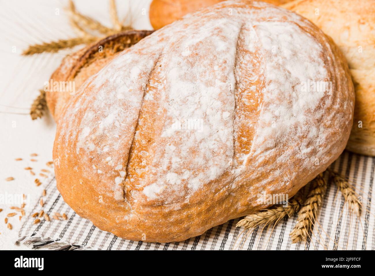 Homemade natural breads. Different kinds of fresh bread as background ...