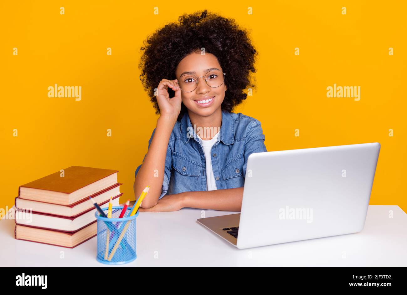 Portrait of beautiful trendy cheery teen girl learner preparing ...