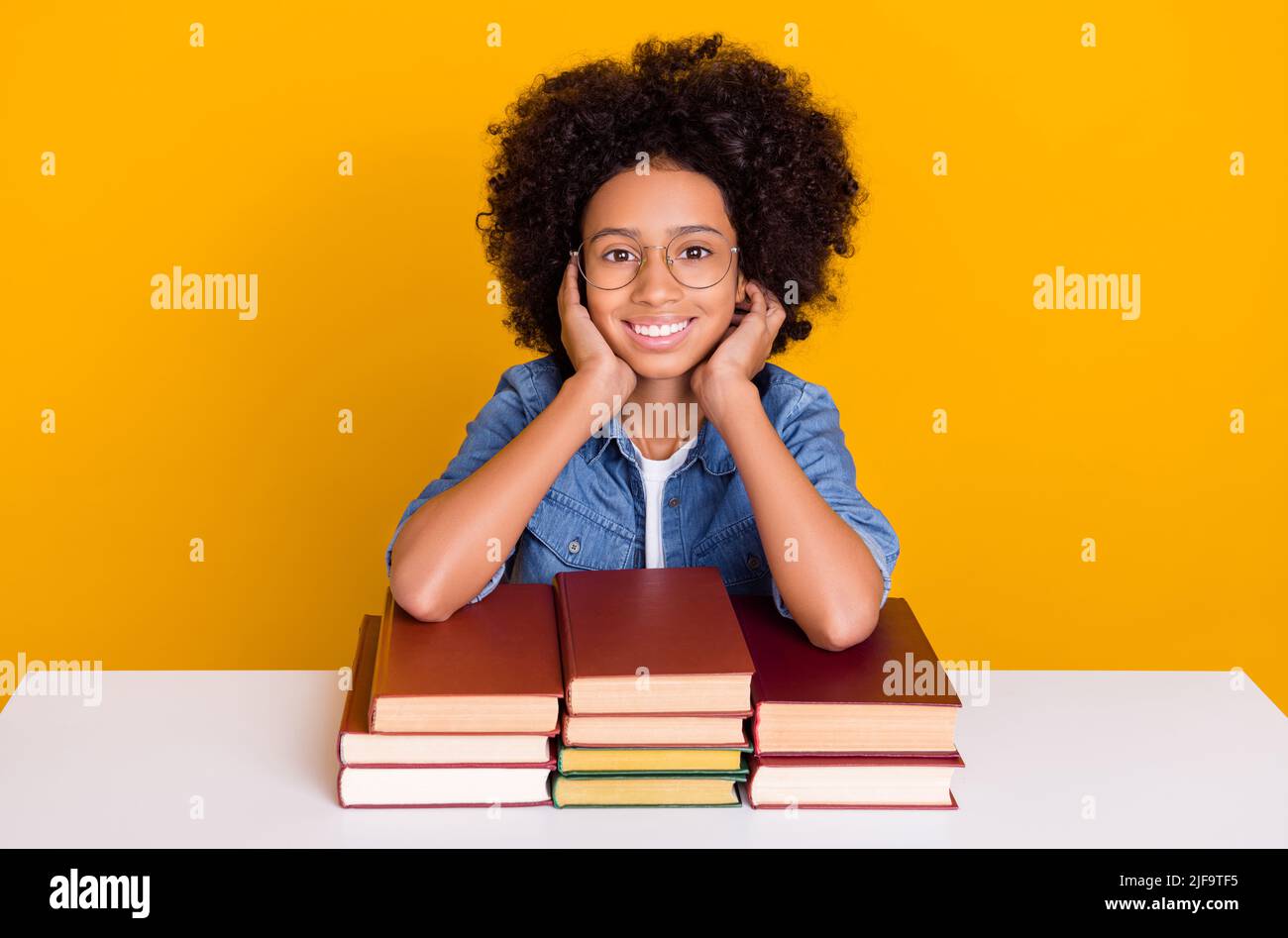 Portrait of beautiful trendy girl preparing academic project visiting ...
