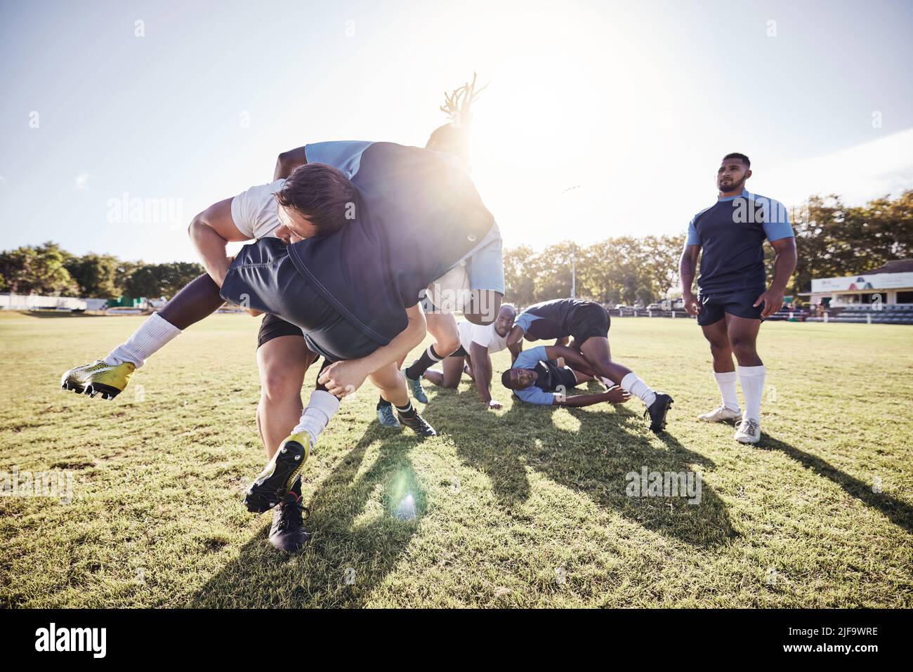 Rugby player tackling opponent hi-res stock photography and images - Alamy