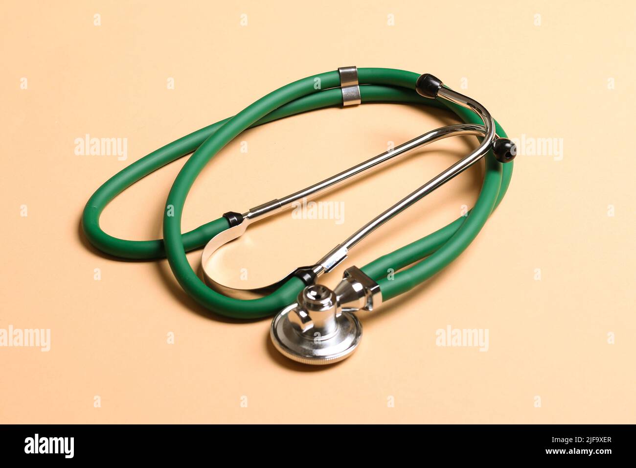Top view of green stethoscope on colorful background. Medical diagnosis ...
