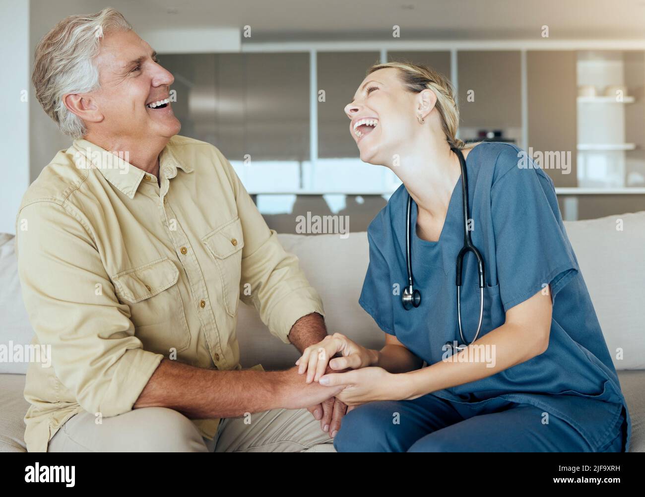 A happy smiling man and woman showing the bond between patient and ...