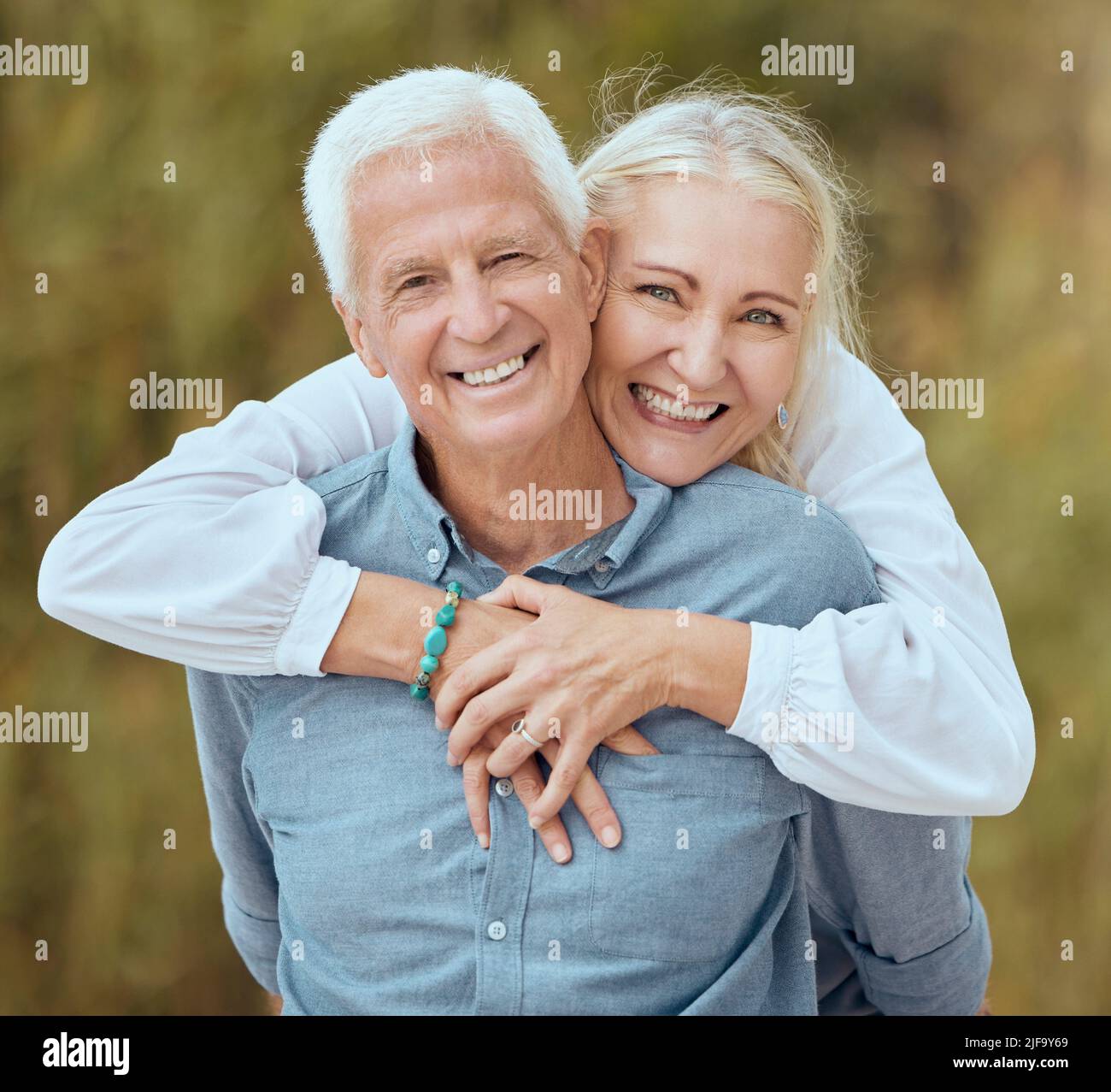 A happy mature caucasian couple enjoying fresh air on vacation at the ...