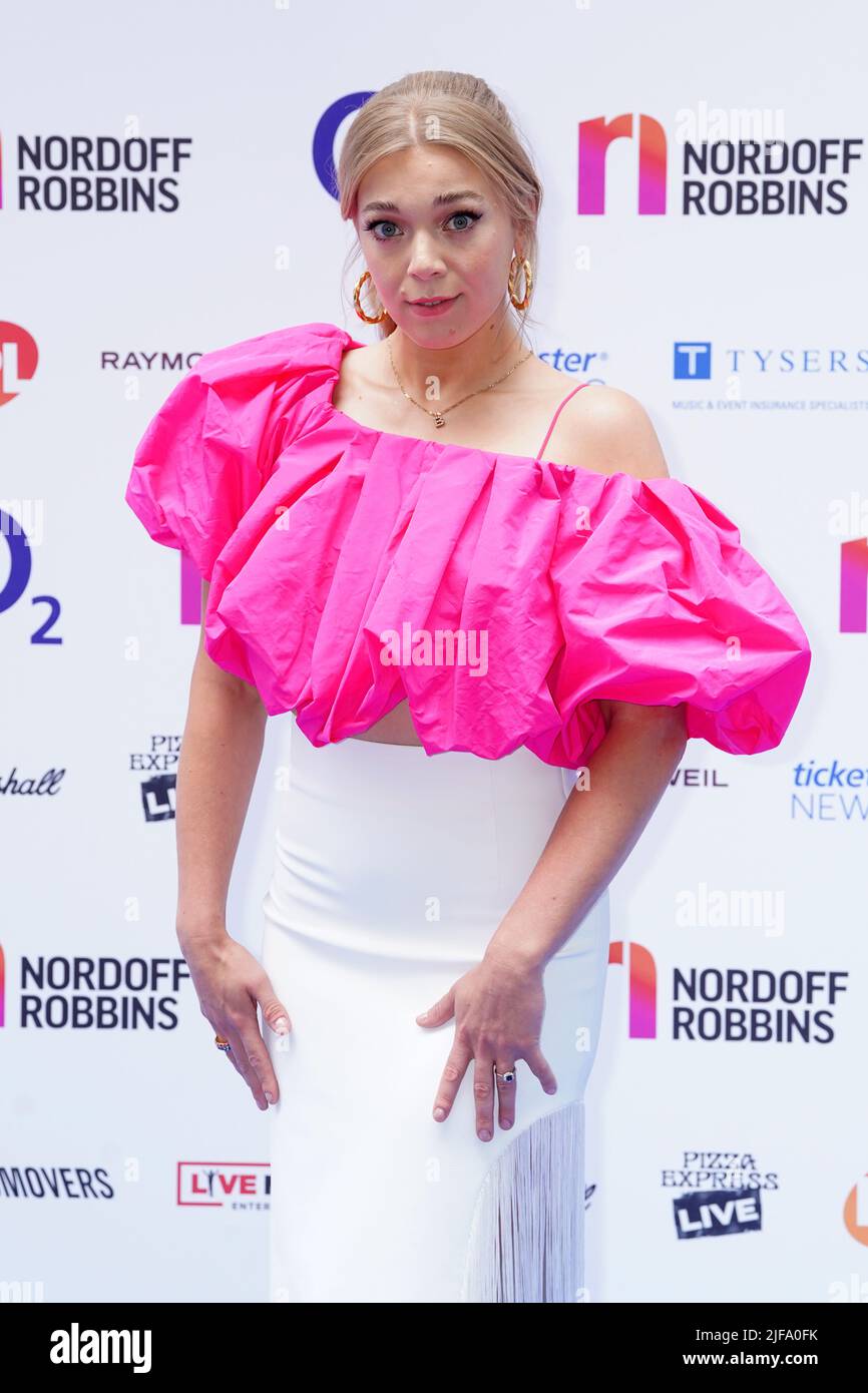 Becky Hill at the Nordoff Robbins O2 Silver Clef Awards at the ...