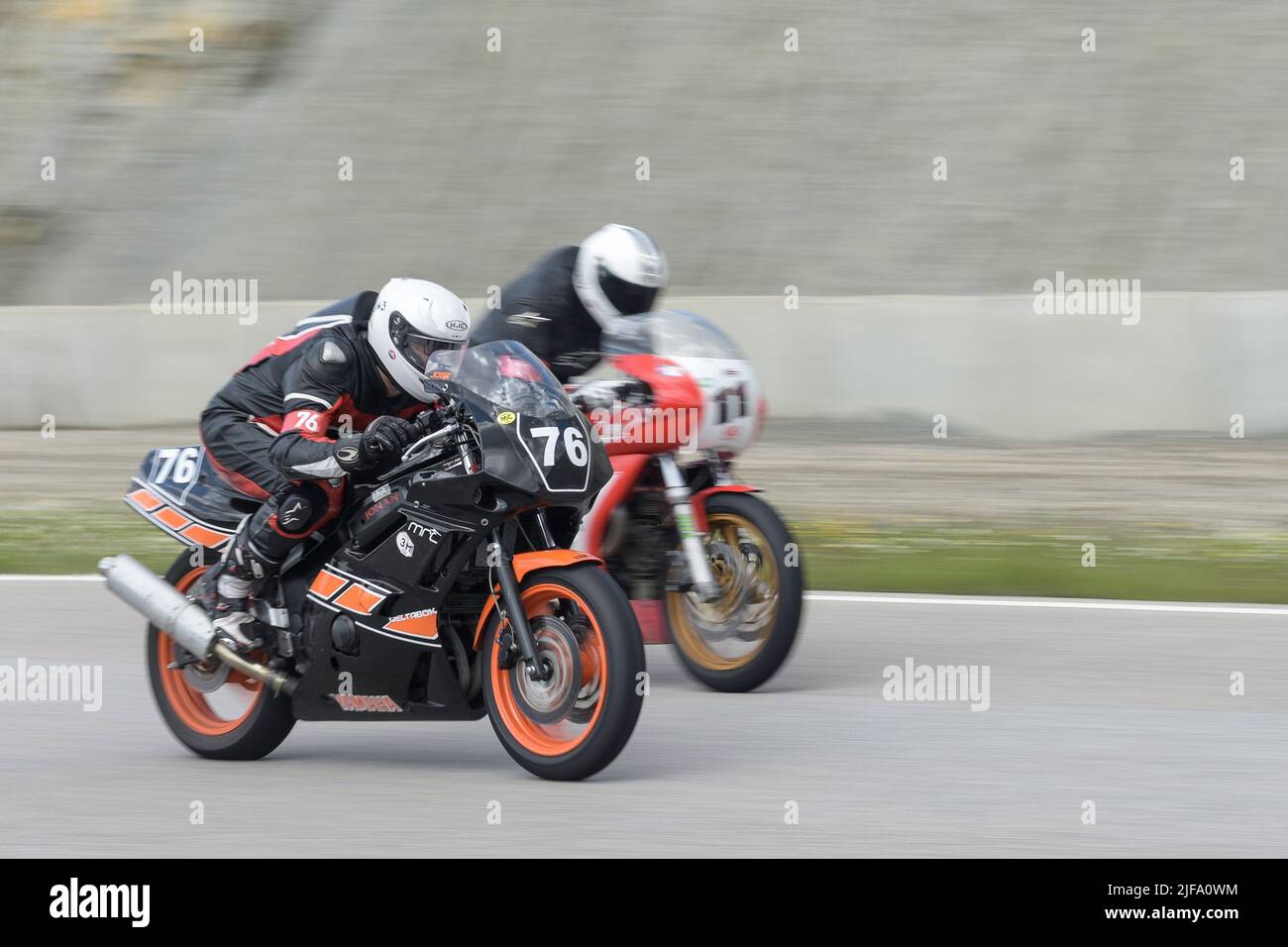 Fast racing motor bike in the track. Yamaha classic Stock Photo - Alamy
