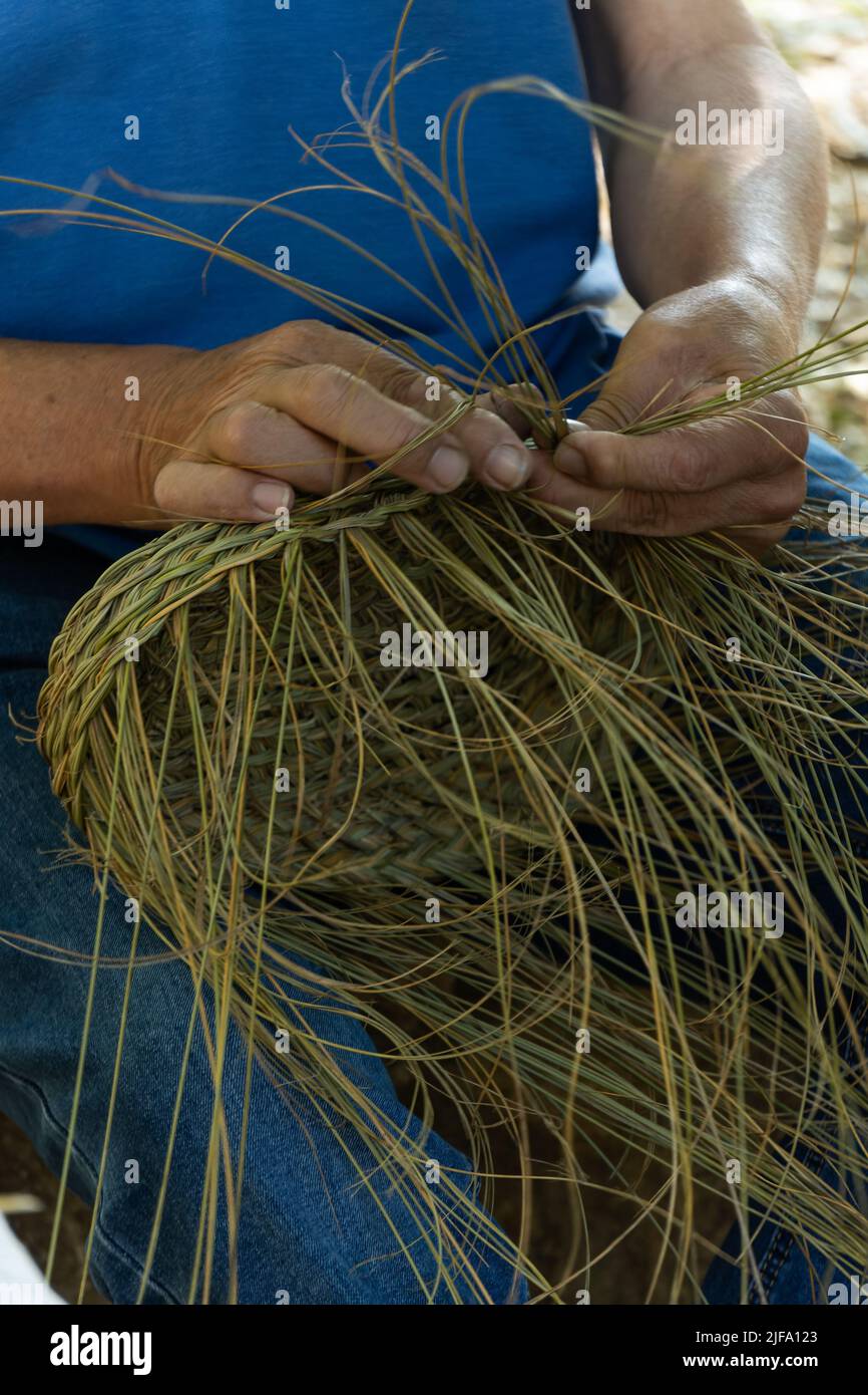 man weaving handcrafted minbread baskets in the traditional way Stock ...