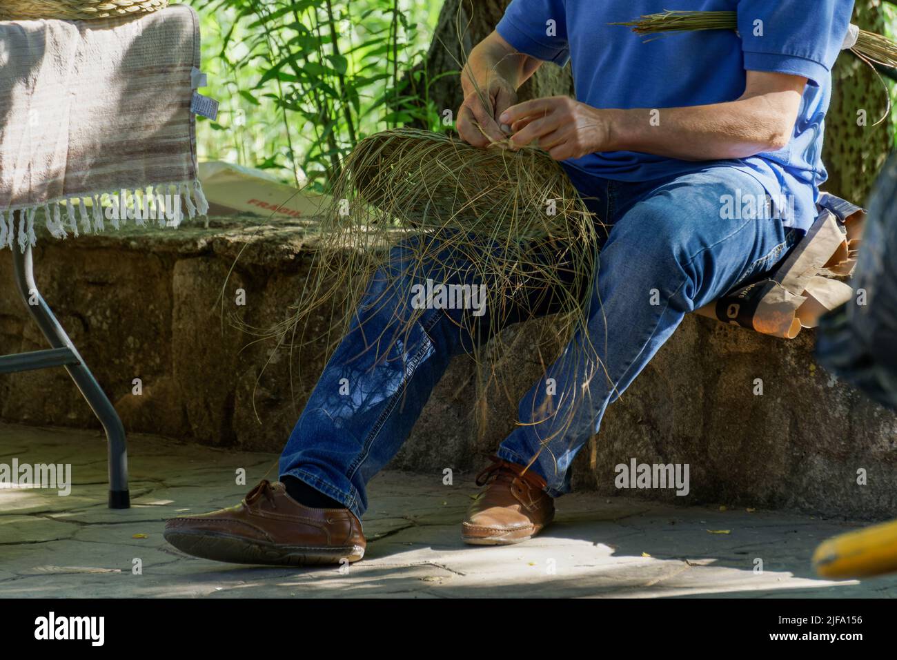 man weaving handcrafted minbread baskets in the traditional way Stock ...