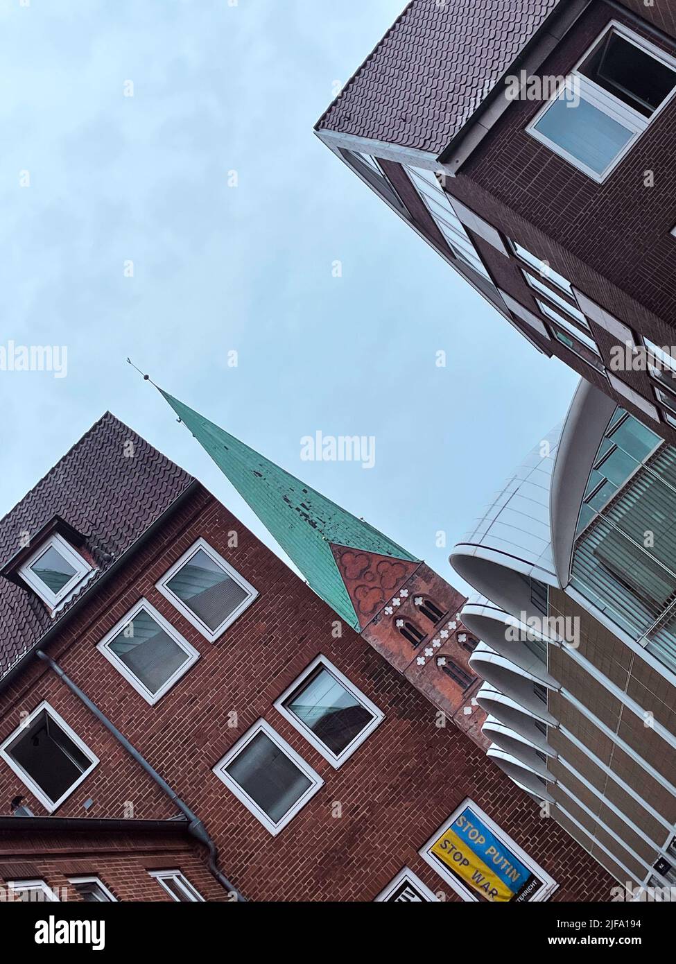 A vertical shot of the city brick-built buildings in Germany Stock ...