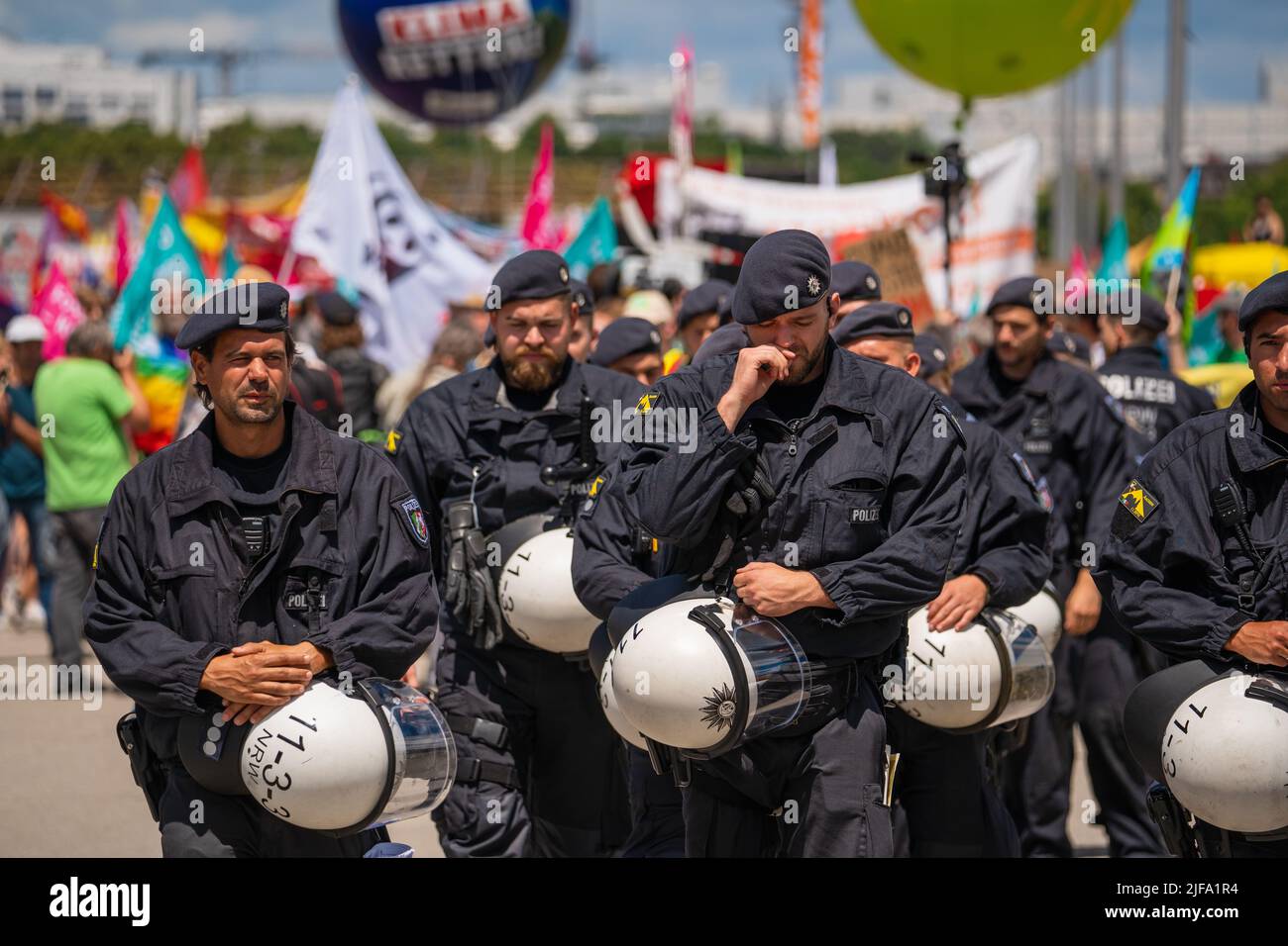Police in riot gear on demonstration. Keep violent protesters at G7 ...