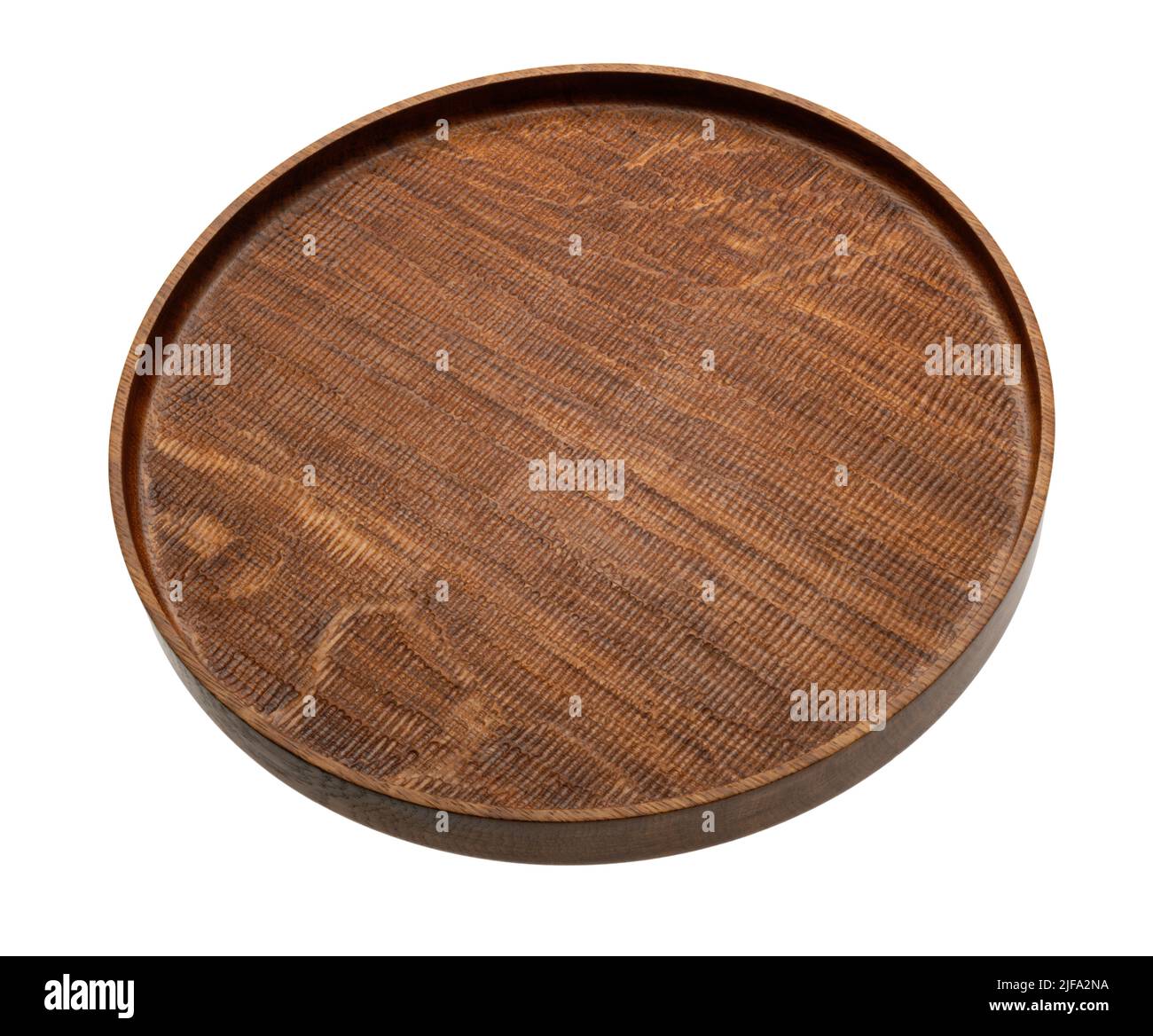 A circular handmade wooden tray to carry items on Stock Photo - Alamy