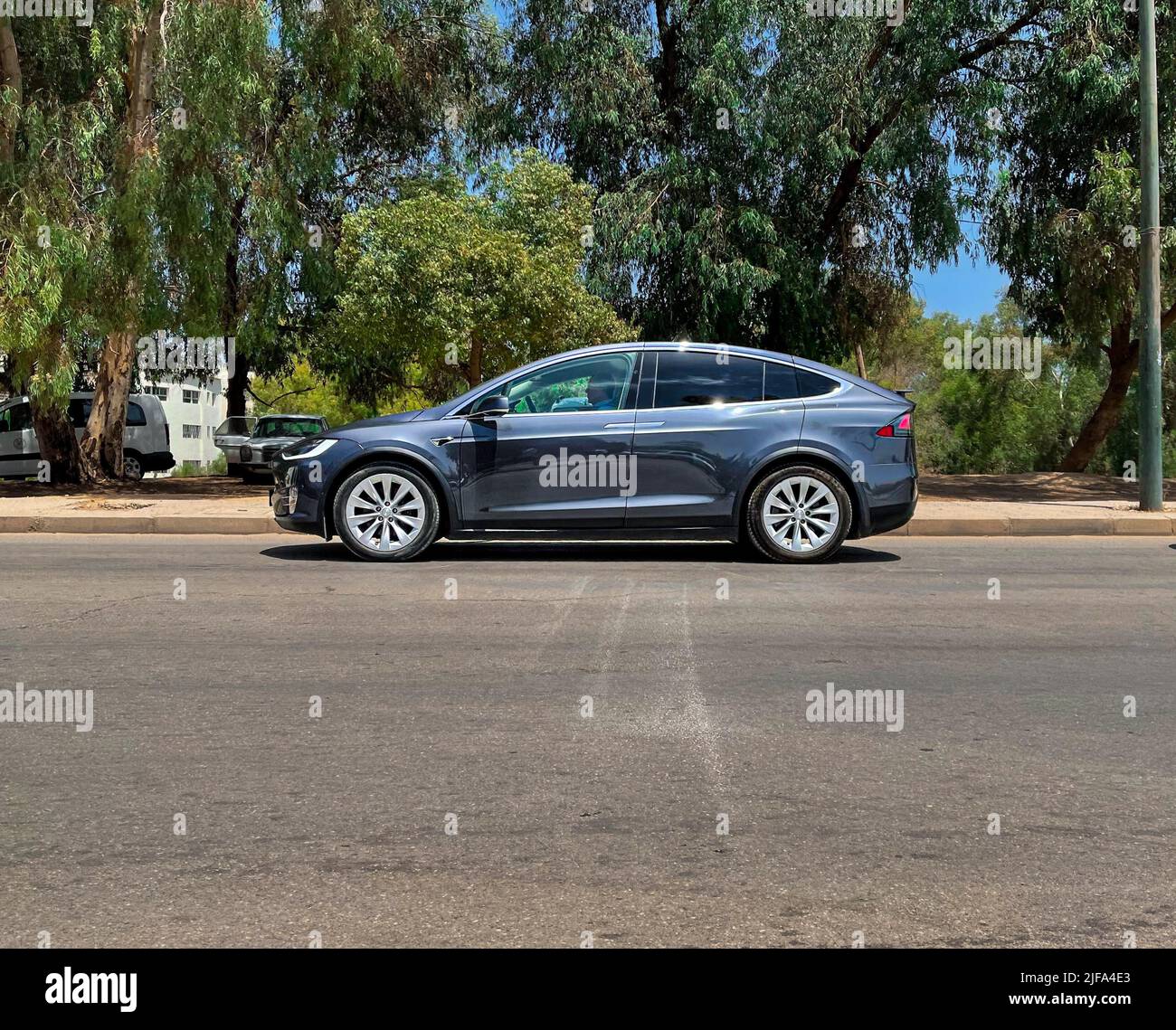 A Tesla model Y on the road Stock Photo - Alamy