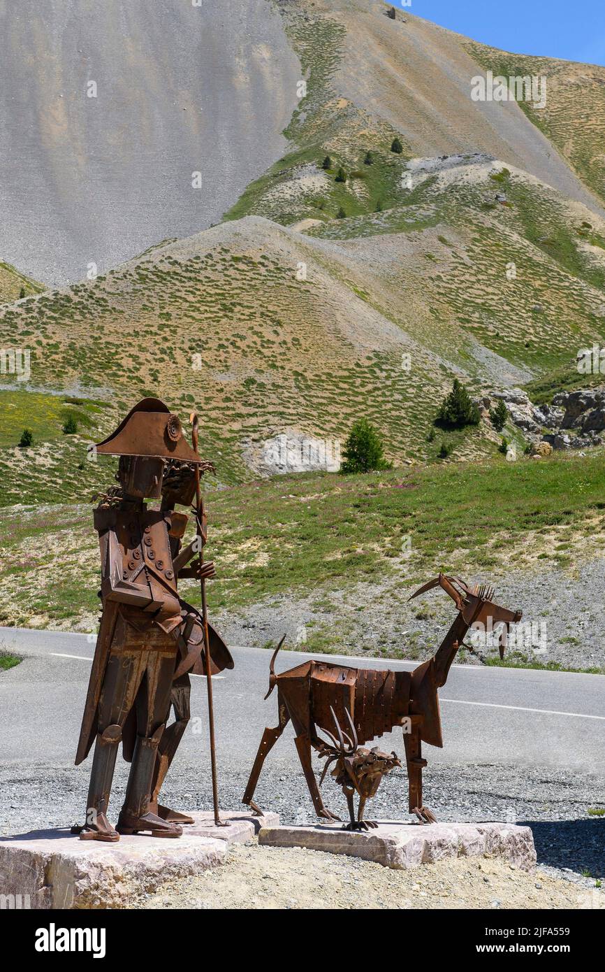 Stylised metal sculpture of Emperor Napoleon, next to it stylised metal ...