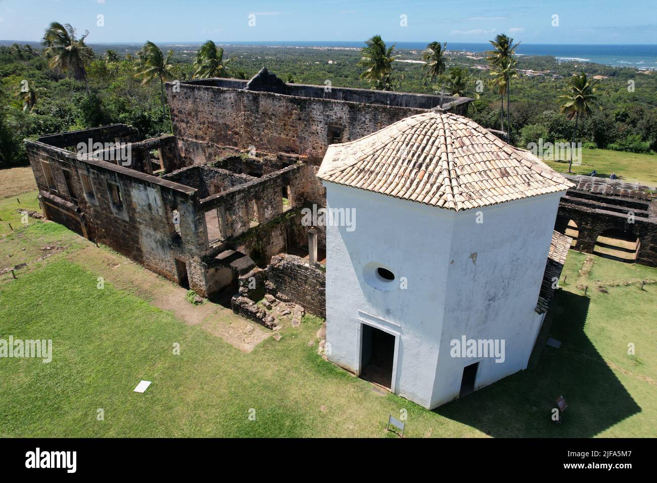 An aerial view of old ruins in Praia do Forte village in Brazil in ...