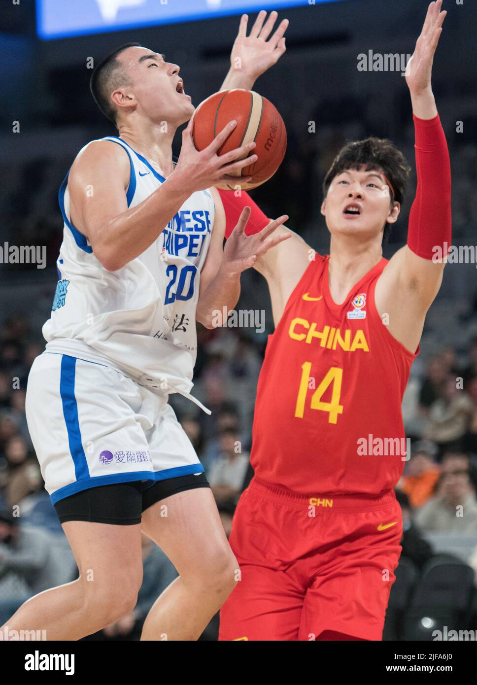 Szu-Yao Sun (L) of Chinese Taipei Basketball team and Zhelin Wang (R) of China Basketball team ...
