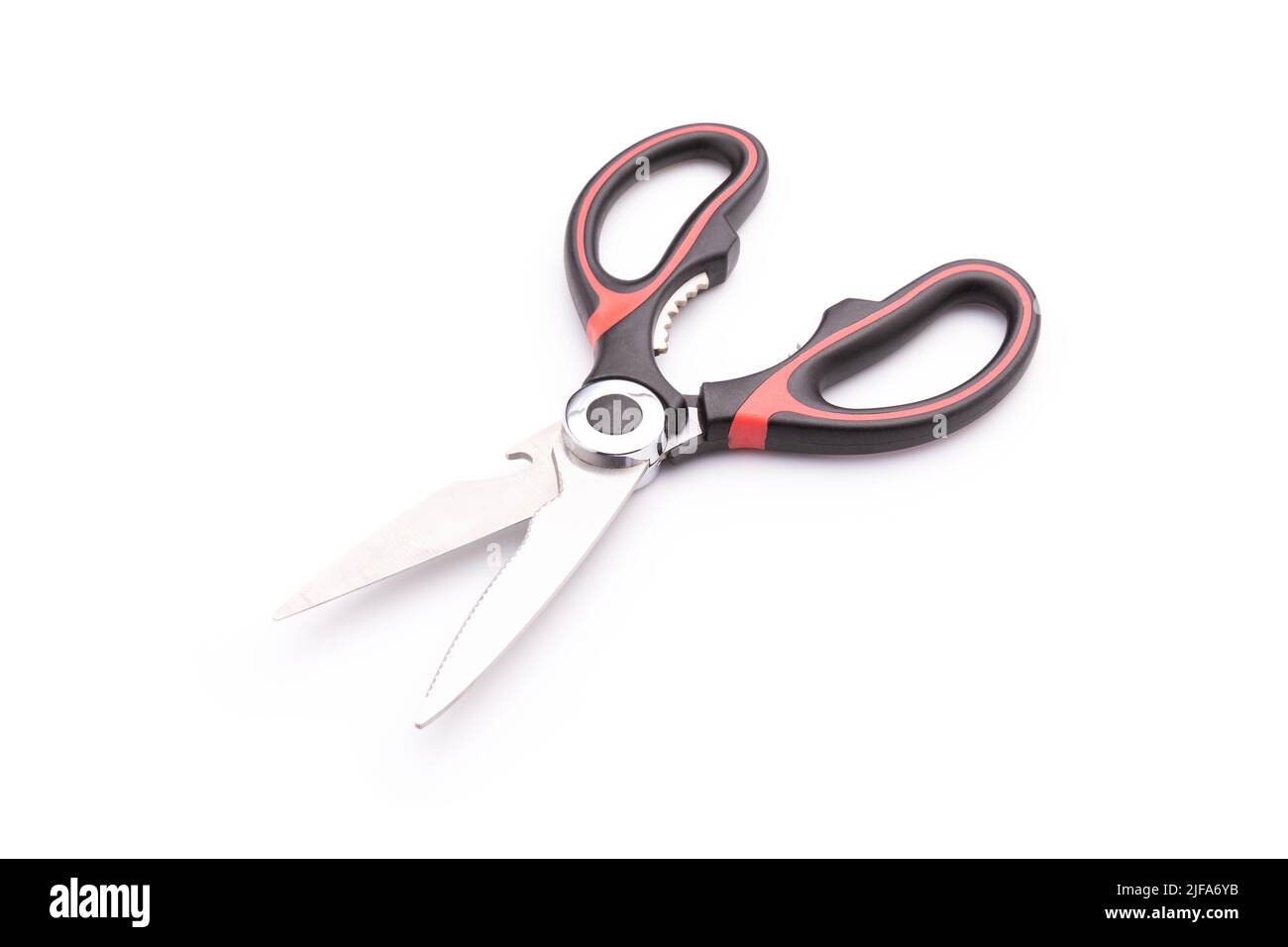 New scissor with red and black color on handle isolated on white ...