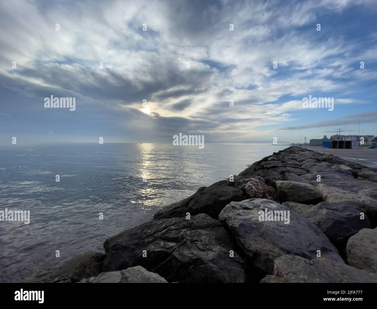 Beautiful sunrise reflection over the Sea Stock Photo - Alamy