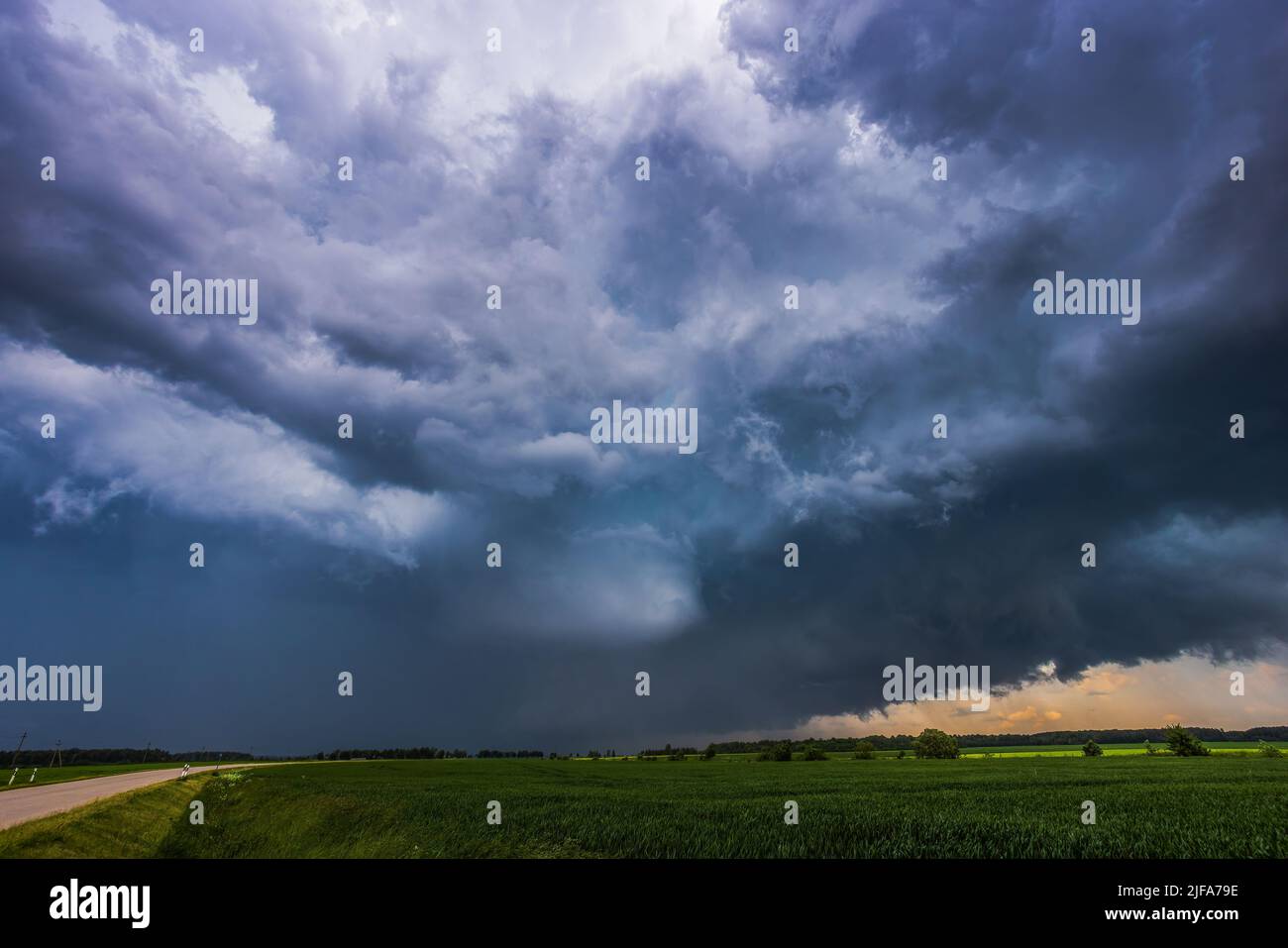 Storm clouds over field, tornadic supercell, extreme weather, dangerous ...