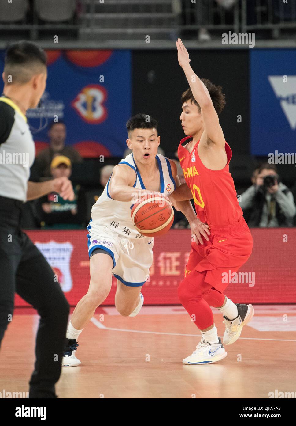 Bing Sheng Lin (L) of Chinese Taipei Basketball team and Jie Xu of ...