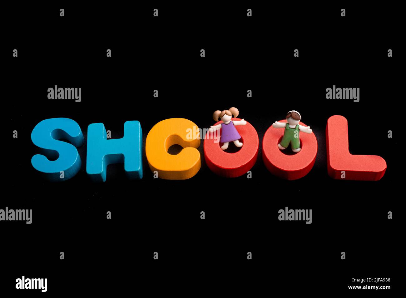 Education concept by School lettering with colorful wooden letters ...