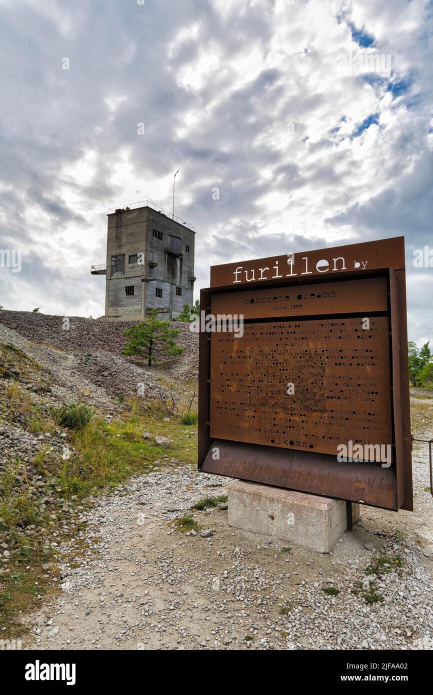 Abandoned industrial building and rusty iron welcome sign, design hotel ...