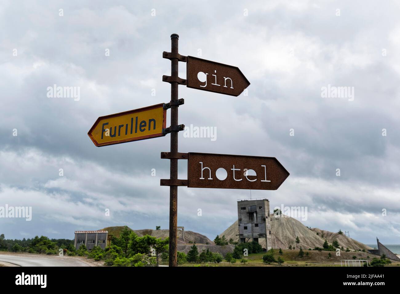 Rusty iron signs, signposts with inscription Furillen, gin, hotel ...