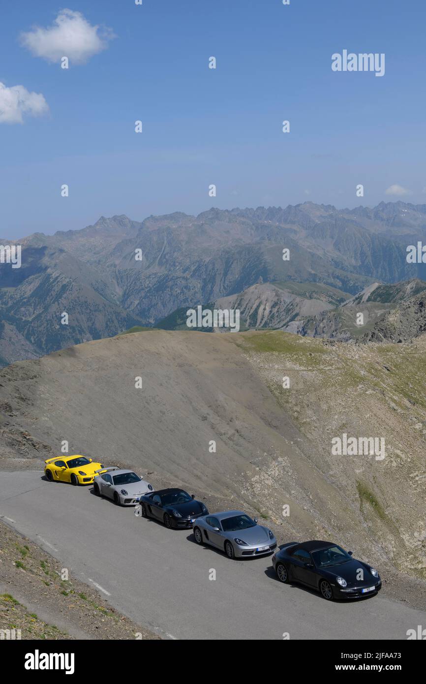 View of five Porsche sports cars on 2802 metre high mountain road ...