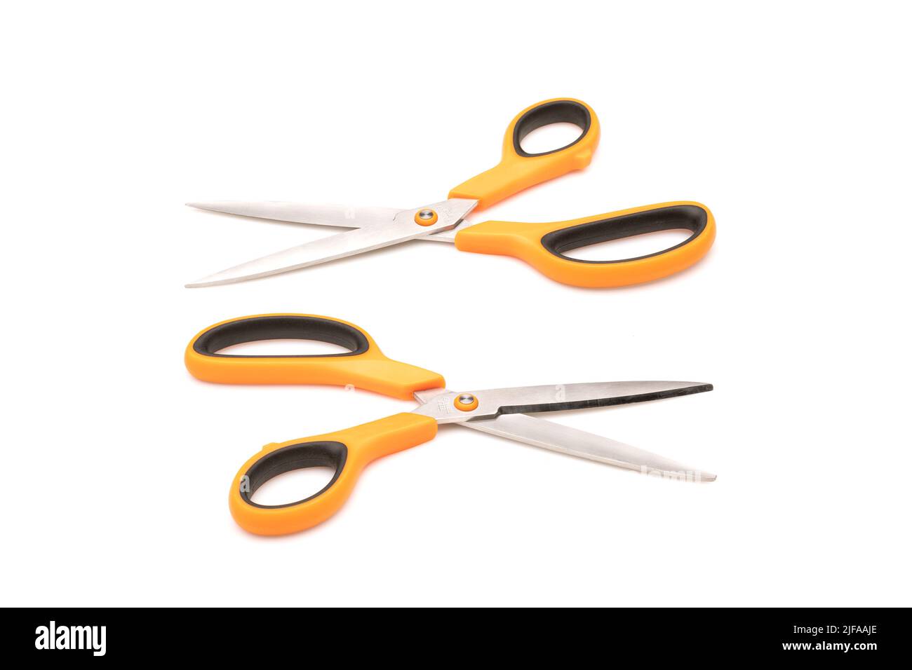 New scissor with orange and black color on handle isolated on white ...