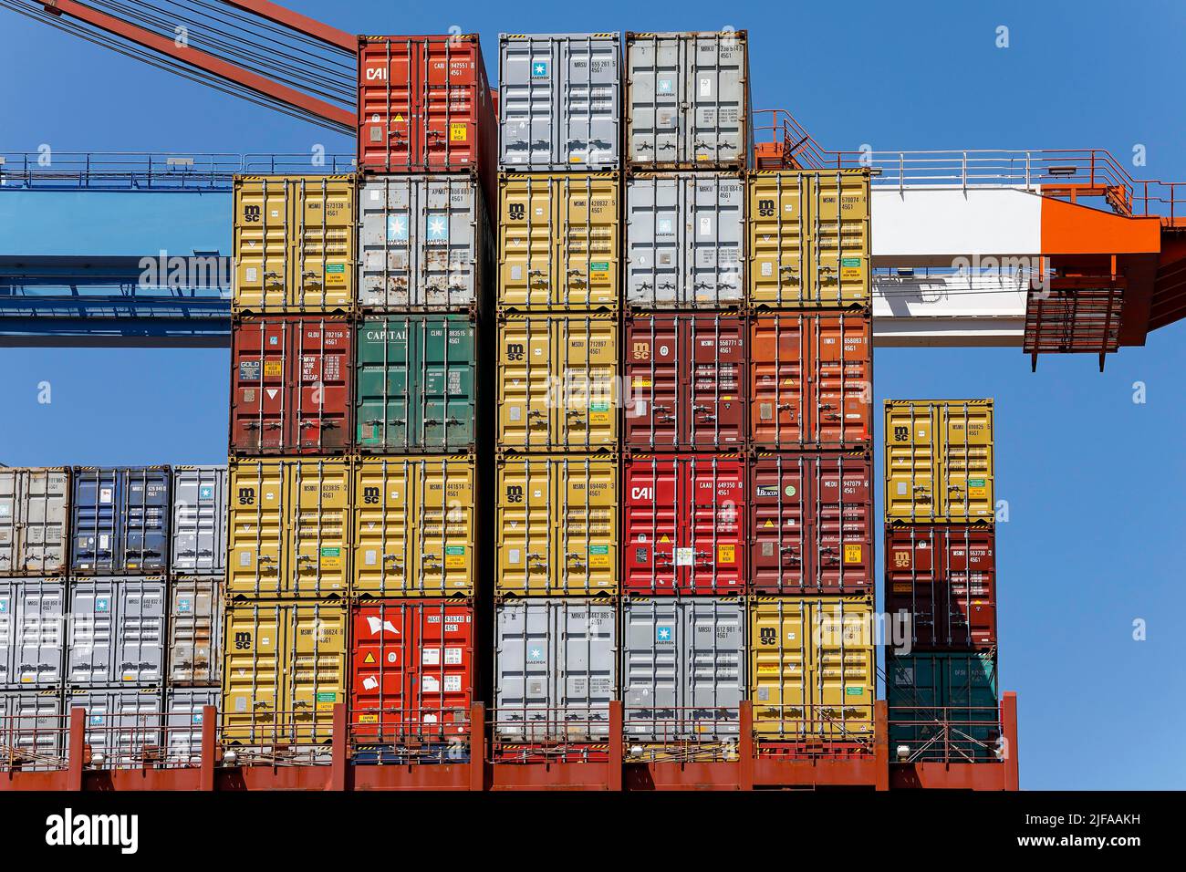 Container loading onto a container ship at the Eurogate container ...