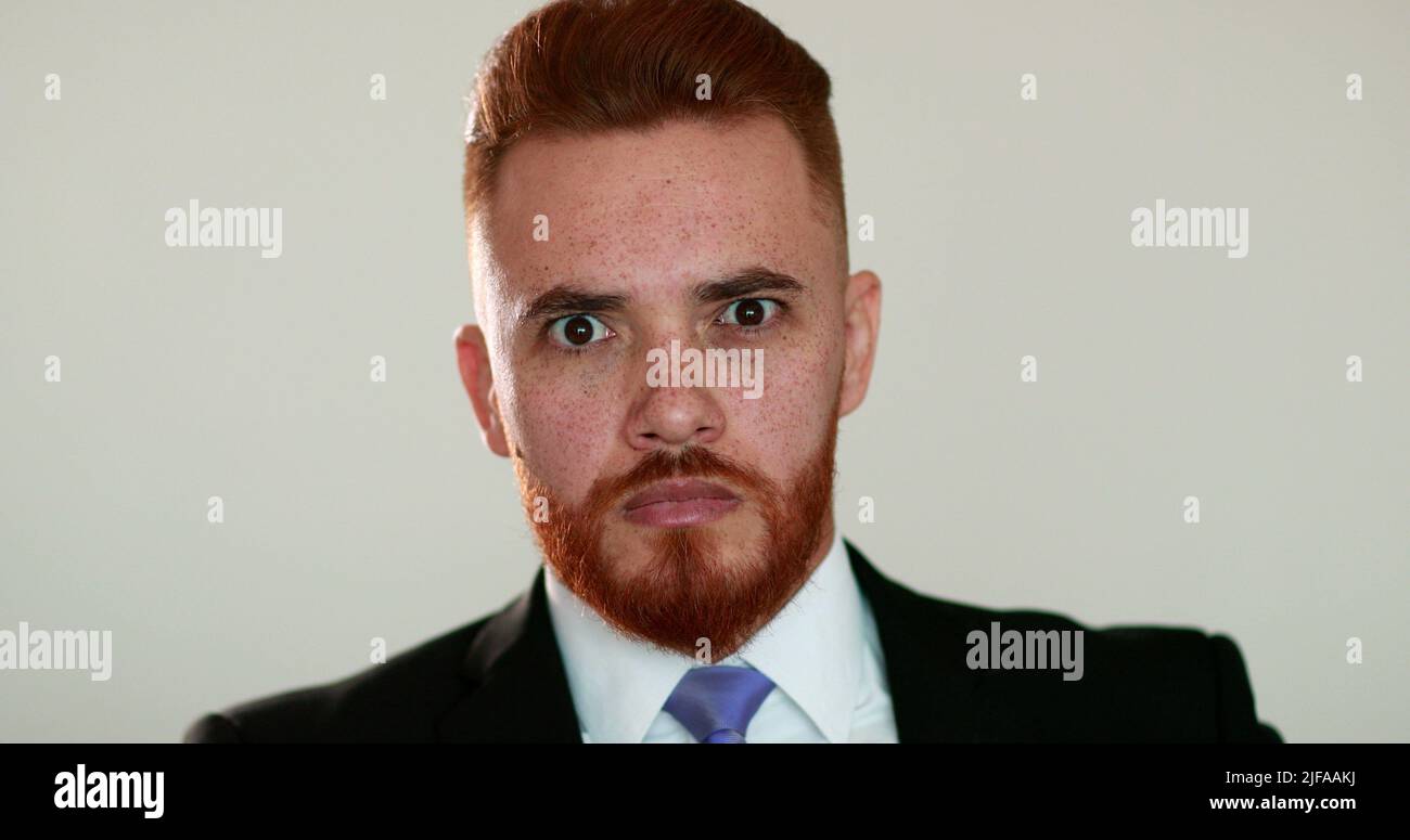 Business man shock reaction. handsome man wearing suit reacting with ...