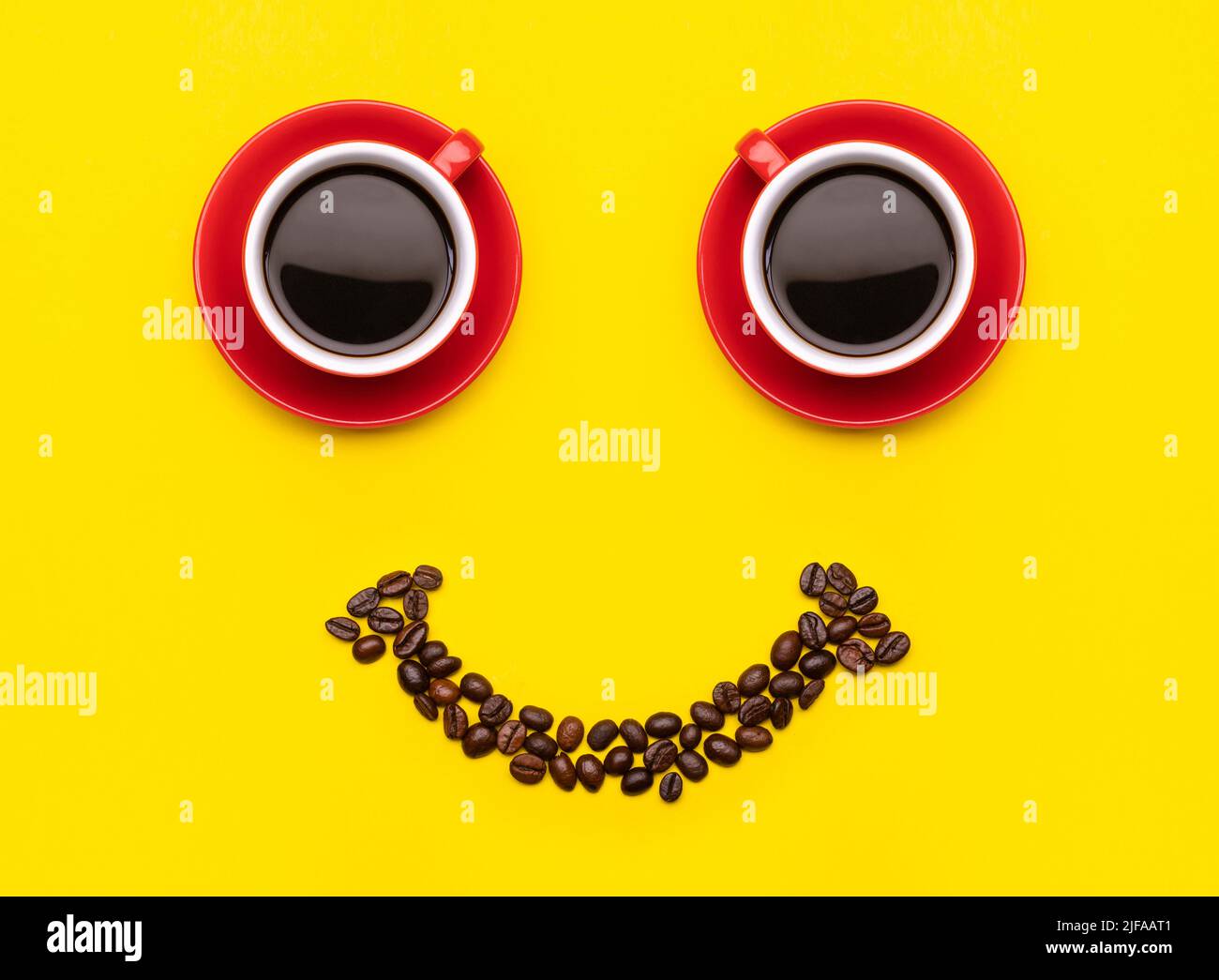 Two cup of coffee and coffee beans with smile face concept, Top view on ...