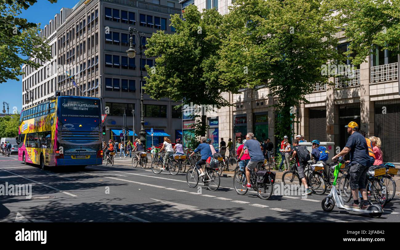 Cyclists and buses in Berlin road traffic, Berlin, Germany Stock Photo ...