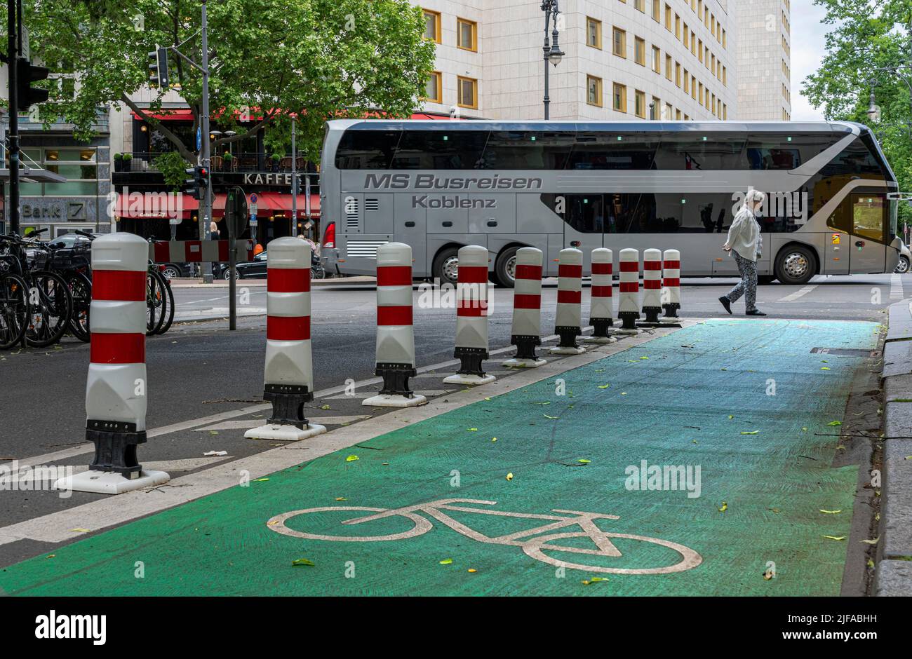 Bicycle lane with green marking and safety bollards, Fasanenstrasse ...