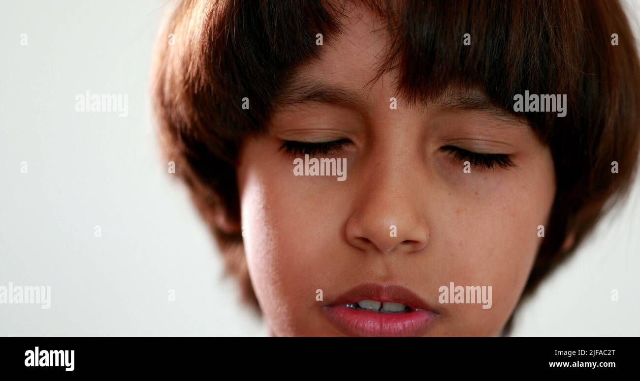 Child praying to God, spiritual child with hands held together, faitful ...