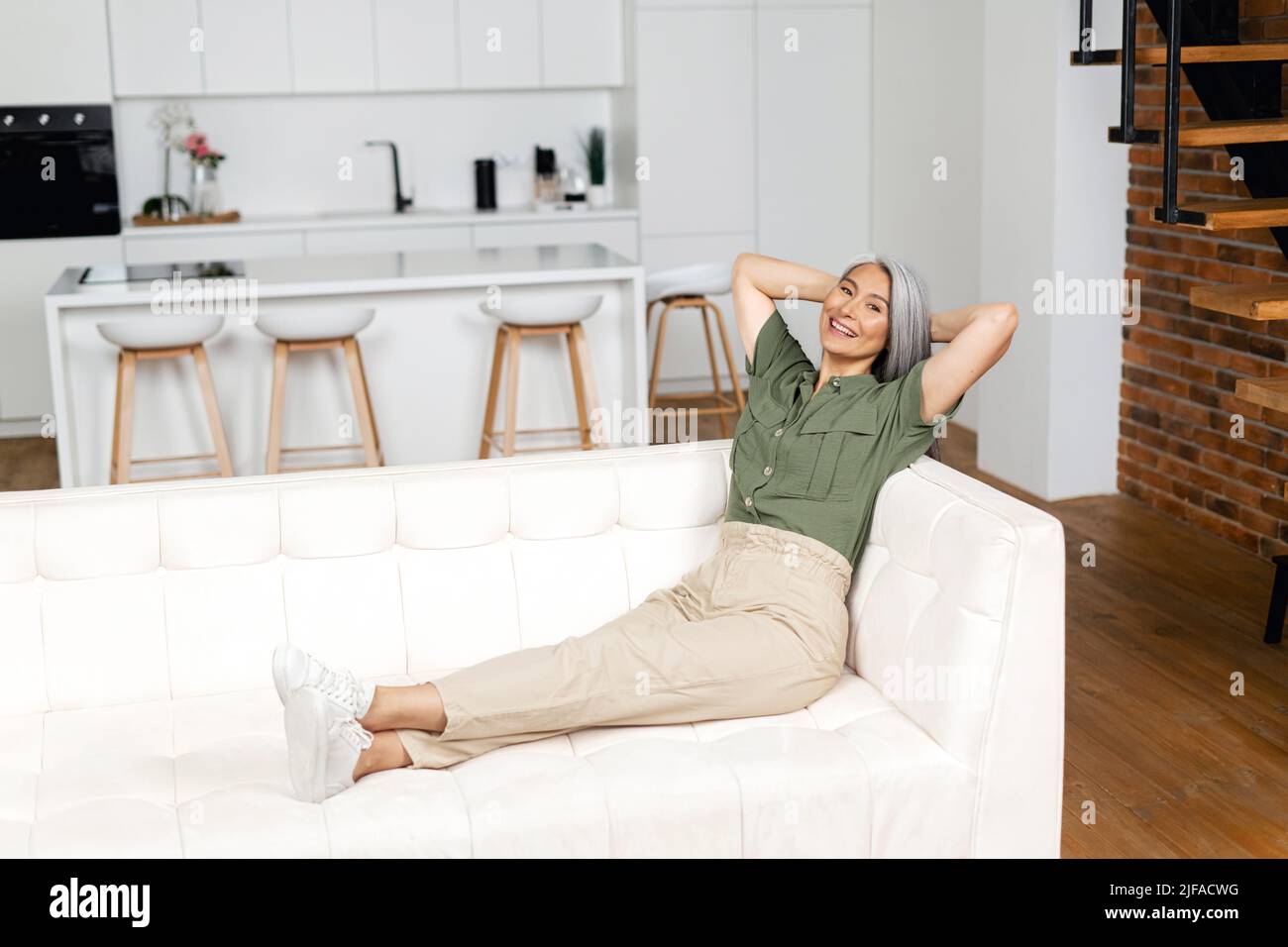 Senior female resting at home. Serene carefree middle-aged woman with ...