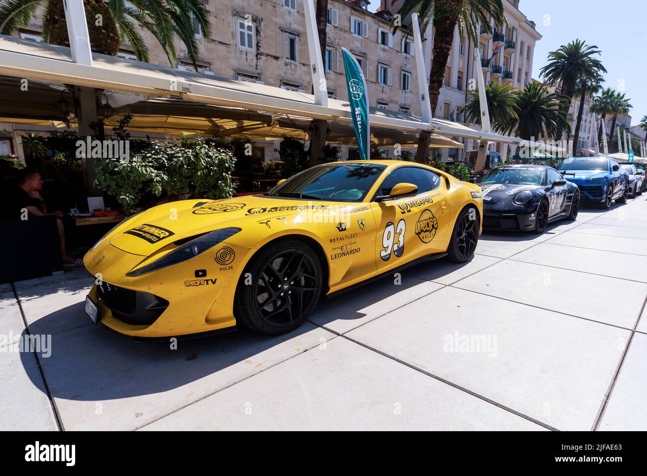 OneLife Rally cars attract the attention of passers-by along the ...