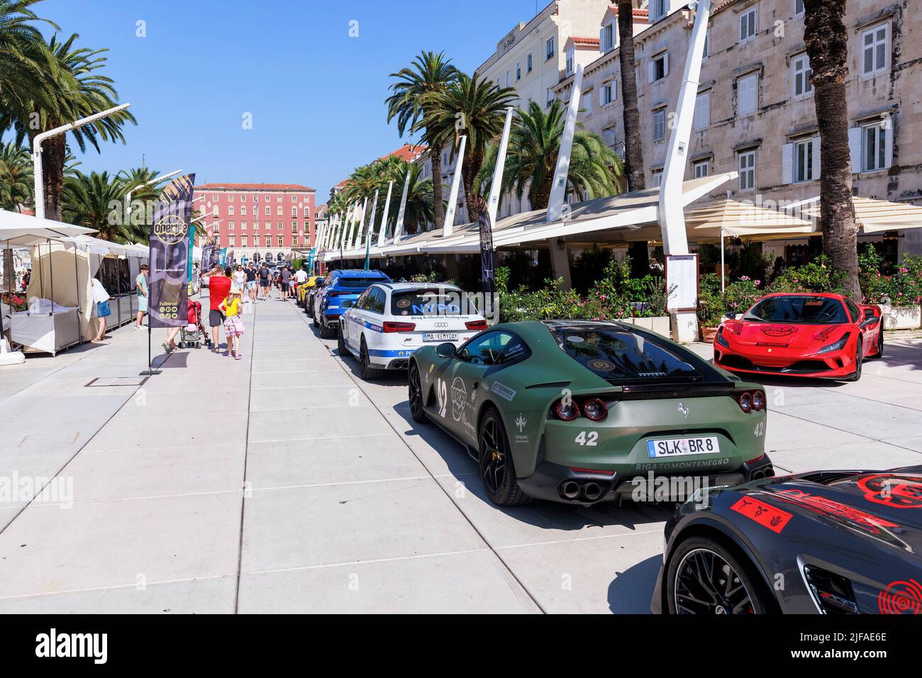 OneLife Rally cars attract the attention of passers-by along the ...