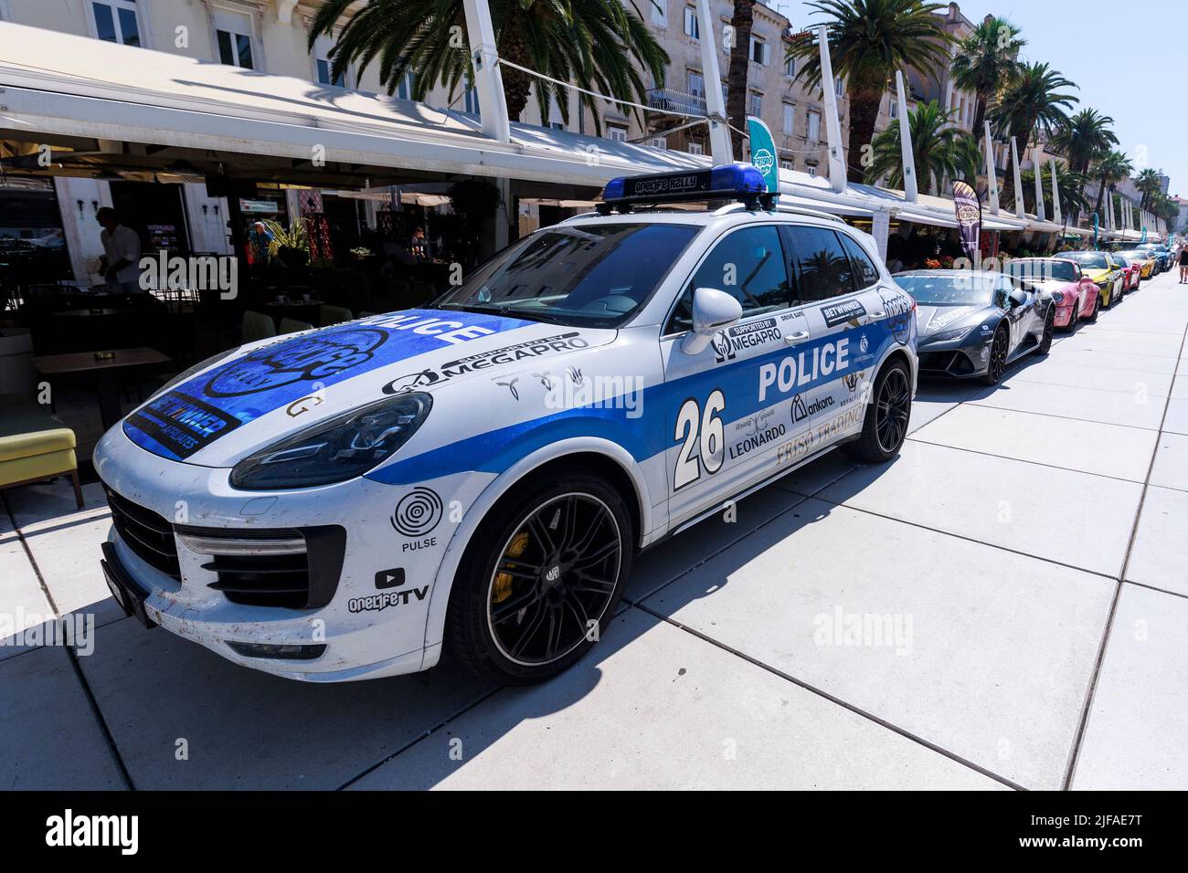 OneLife Rally cars attract the attention of passers-by along the ...